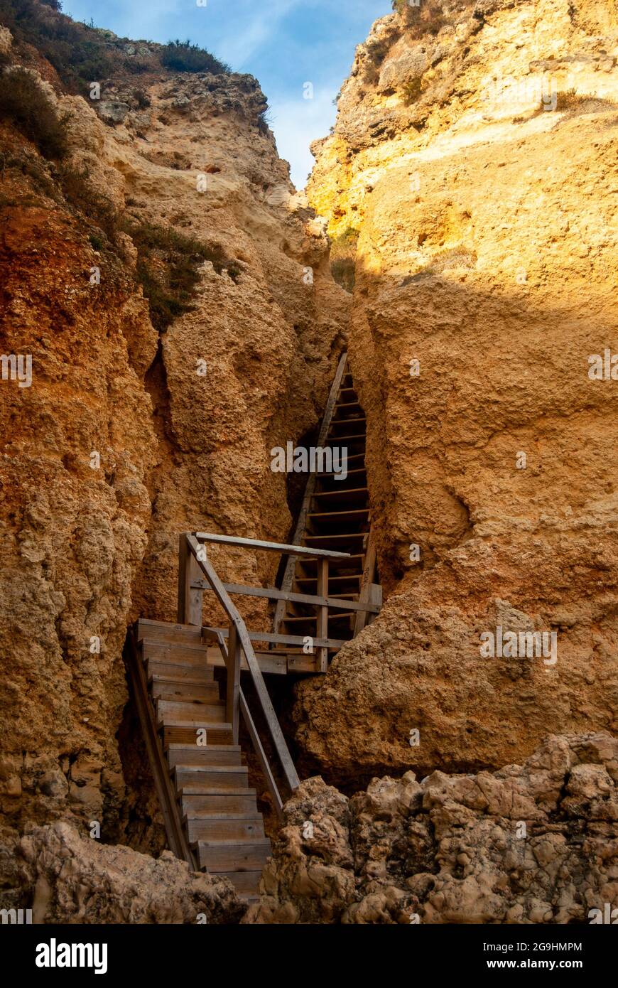 Wooden stairs hidden between the cliffs Stock Photo - Alamy