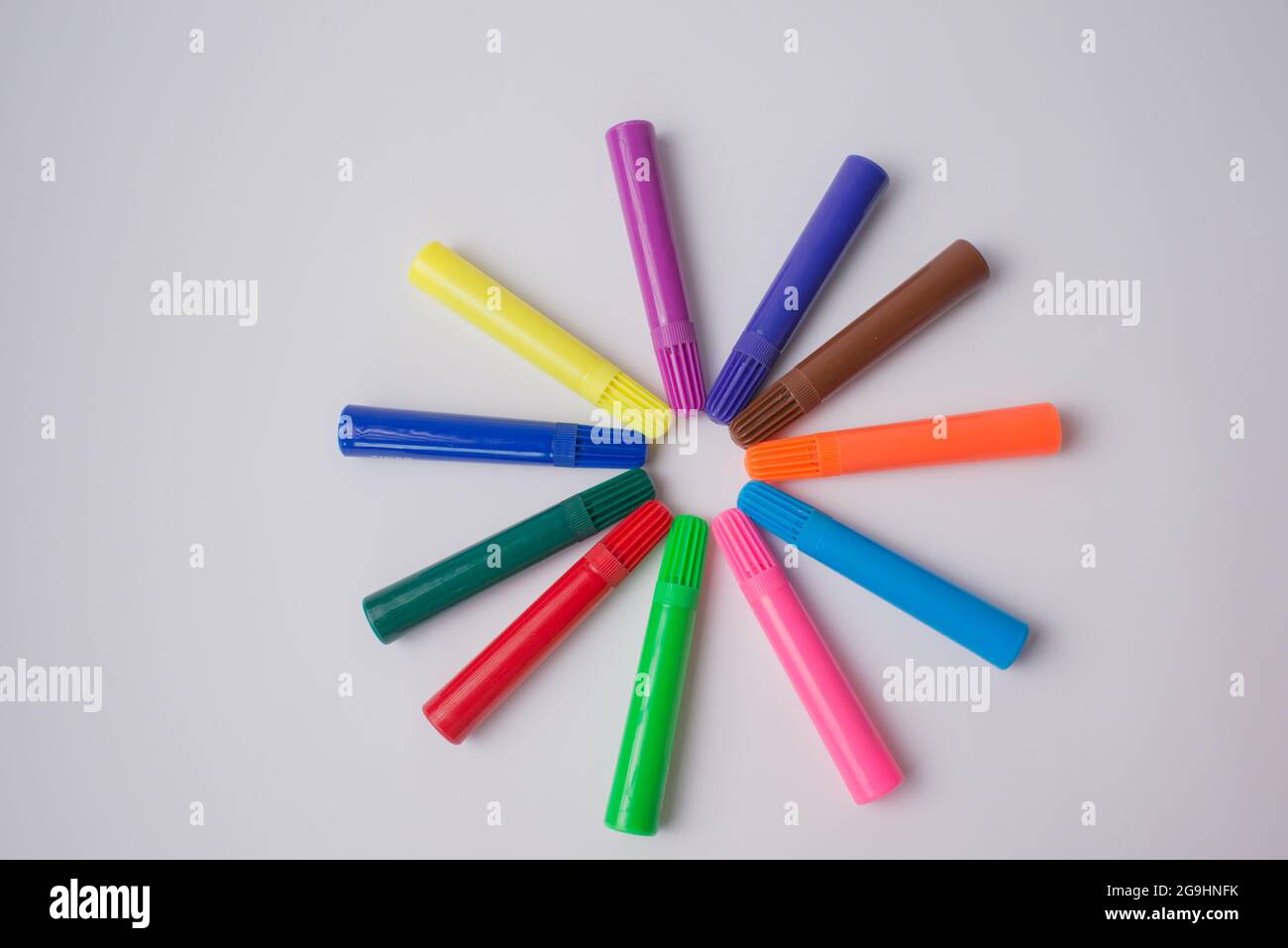 Set of colorful marker pens over white background. Star shaped design ...