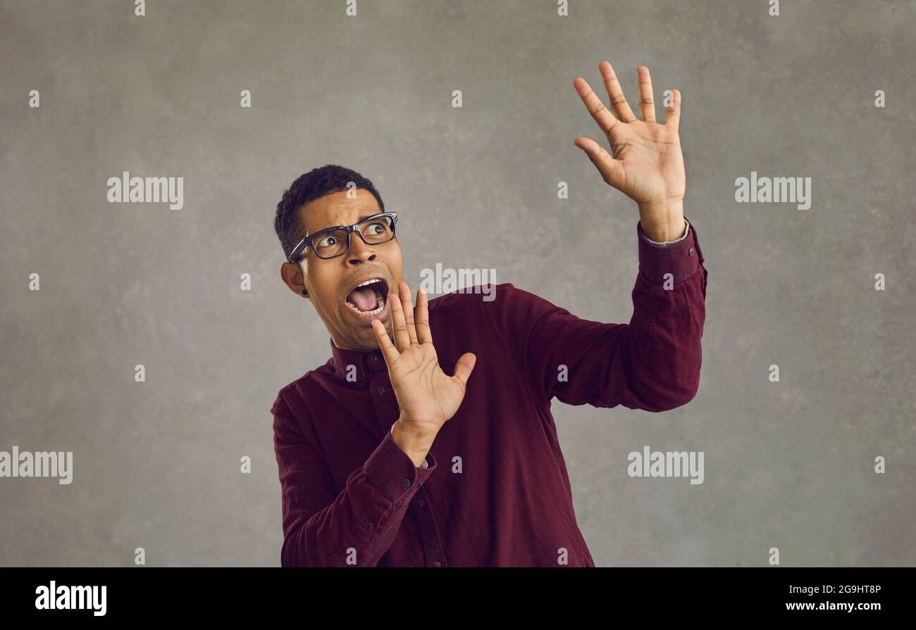 Man waving in panic hi-res stock photography and images - Alamy