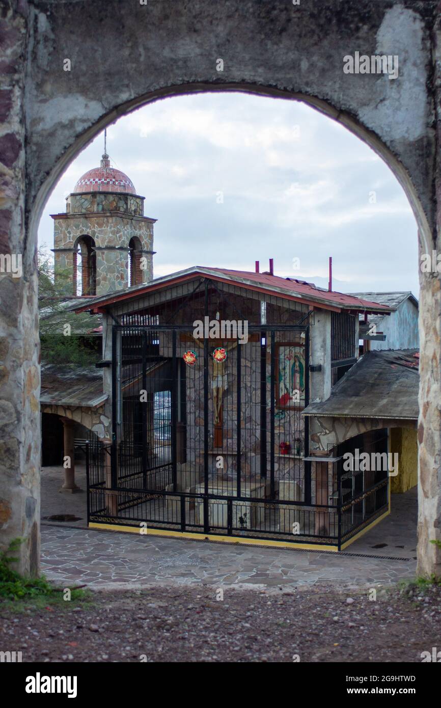 View of the old church through the arched doorway Stock Photo - Alamy