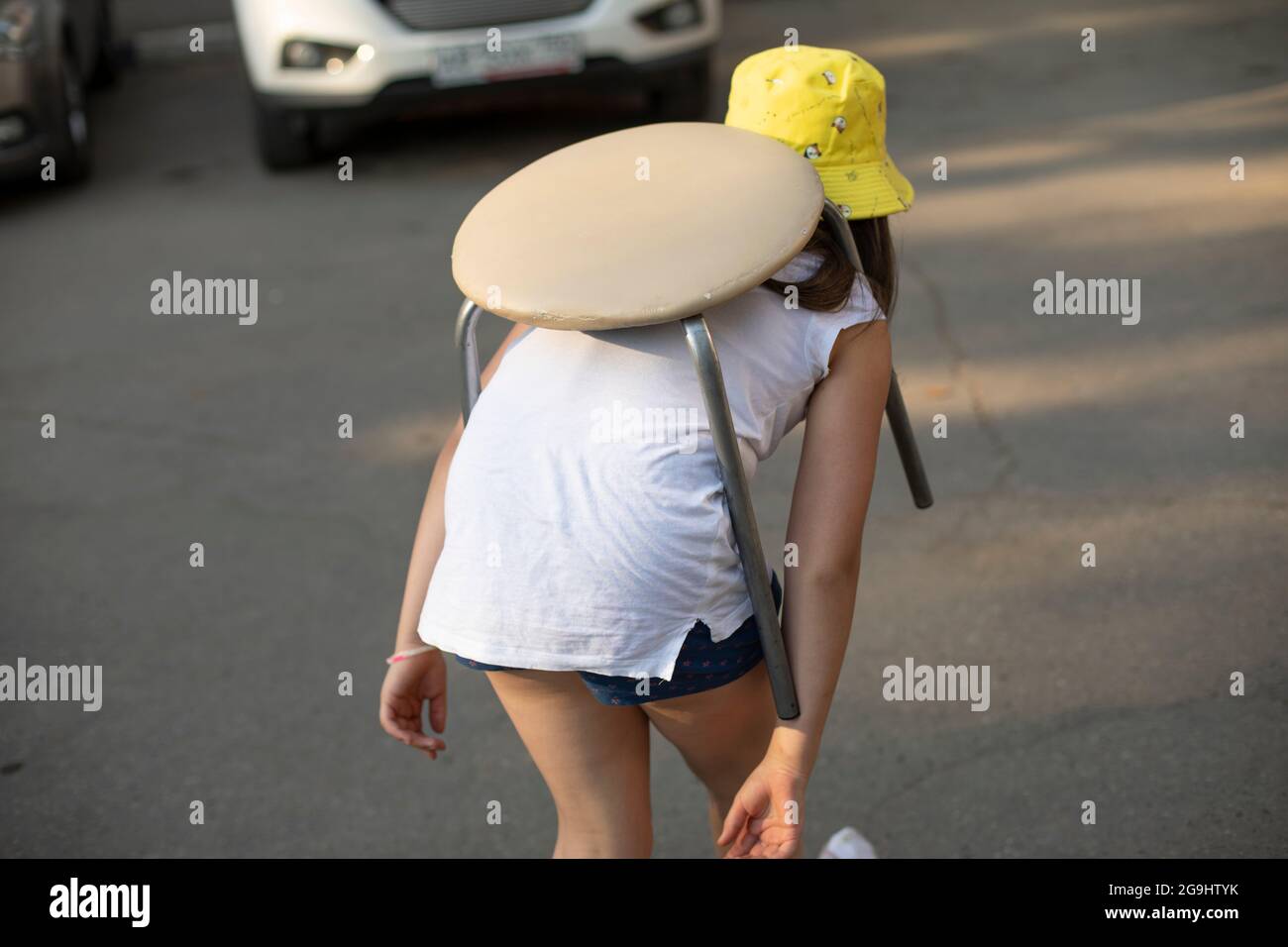 Dragging a chair hi-res stock photography and images - Alamy