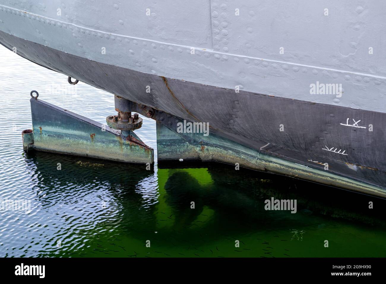 rudder of an old freight ship with reveted hull Stock Photo - Alamy