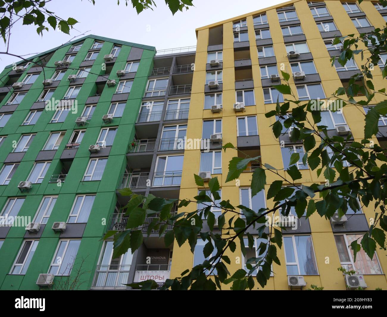 Colorful apartment buildings of a private residence in left bank of ...
