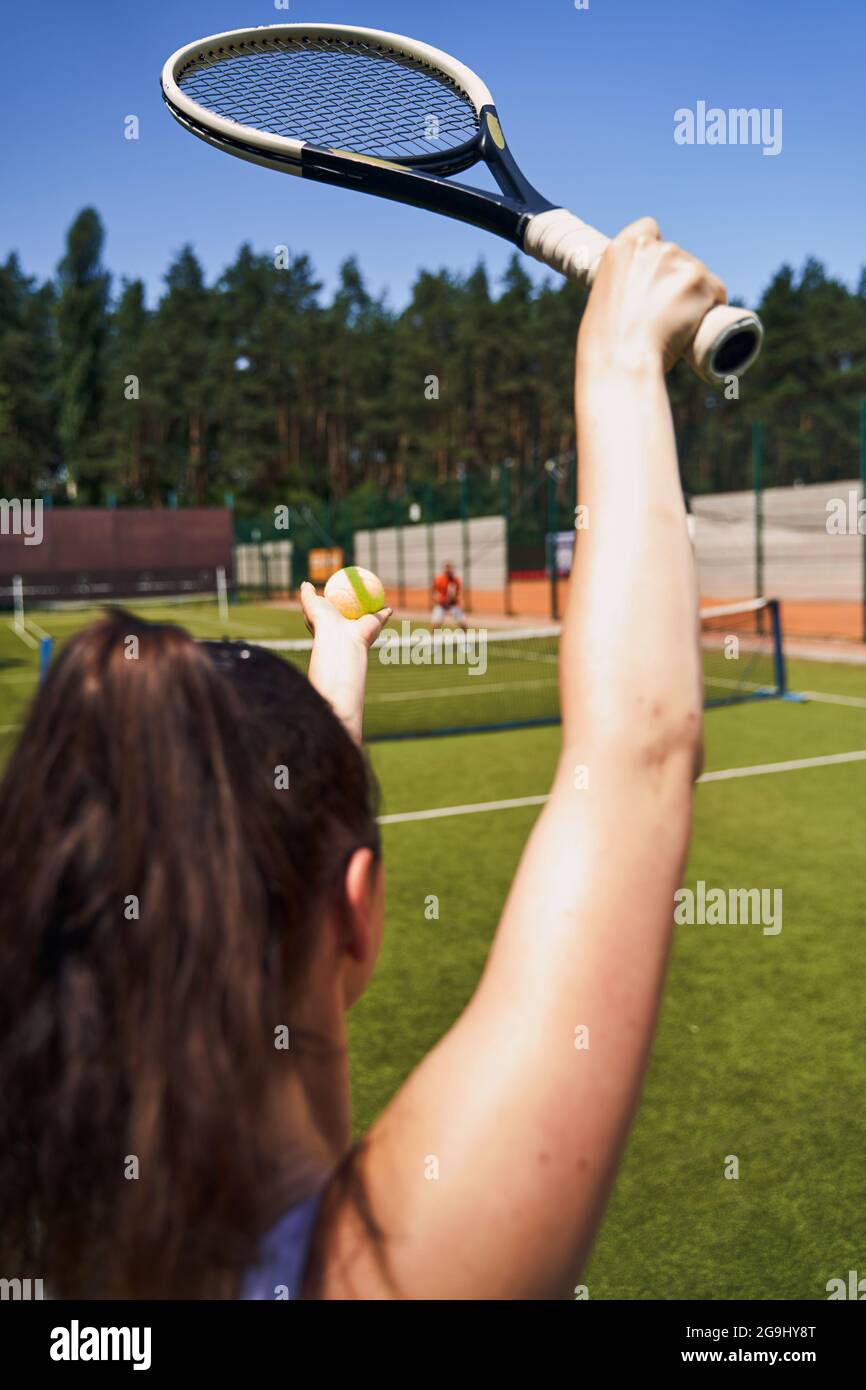 Professional athlete playing a singles match with her tennis partner ...
