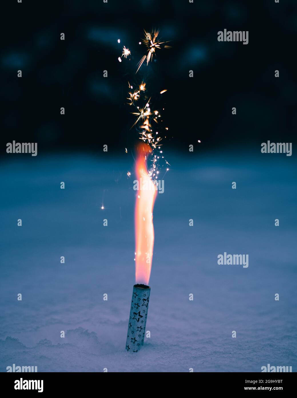 Vertical shot of an exploding firework on a floor Stock Photo - Alamy