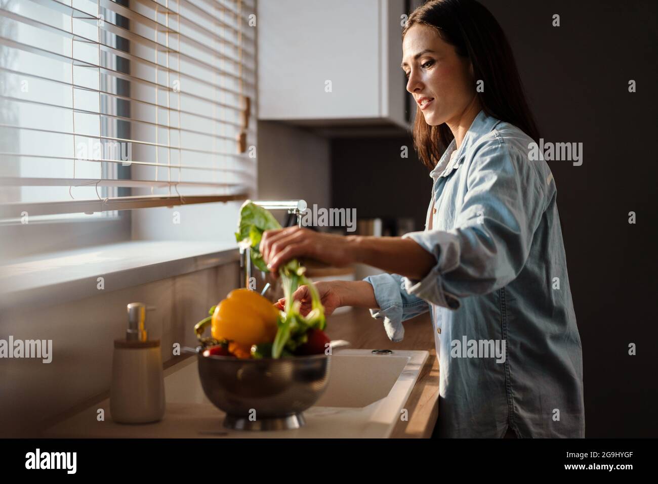 Caucasian charming woman washing hi-res stock photography and images ...