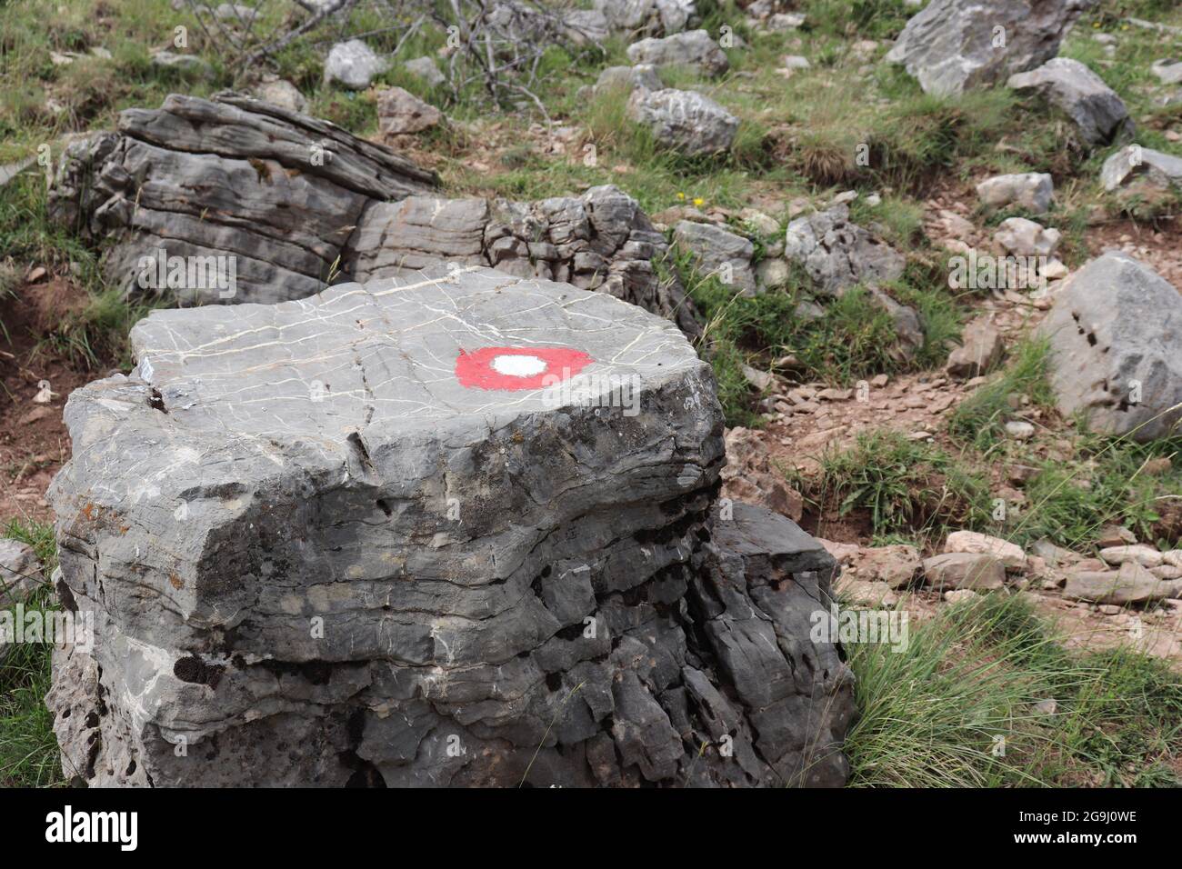 Red blaze on mountain path Stock Photo - Alamy