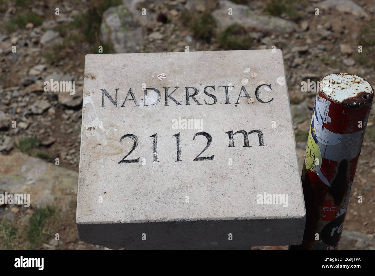 Mountaineering mark of the peak Nadkrstac, altitude 2112 meters above ...