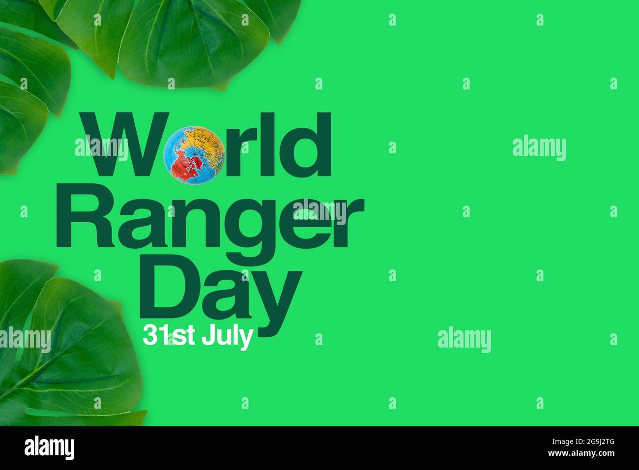 WORLD RANGER DAY text and leaves on green background. WORLD RANGER DAY ...