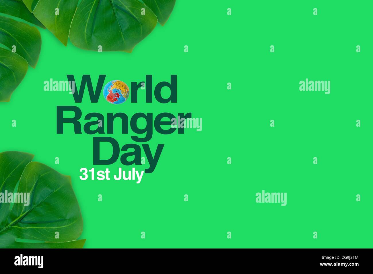 WORLD RANGER DAY text and leaves on green background. WORLD RANGER DAY ...