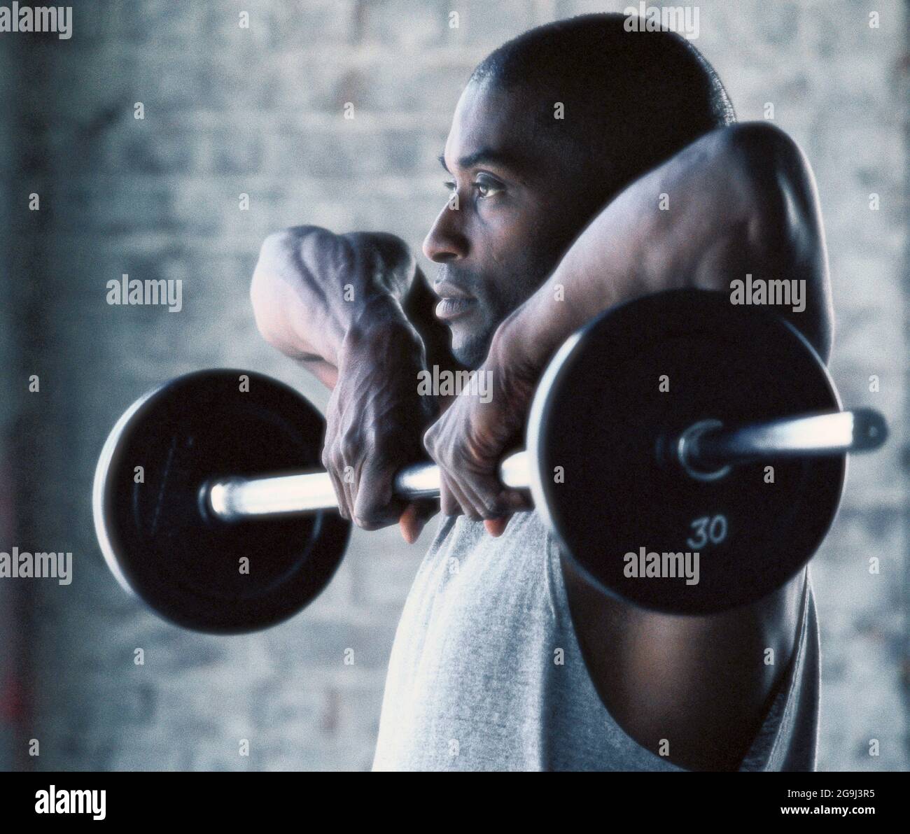A man weight lifting Stock Photo - Alamy