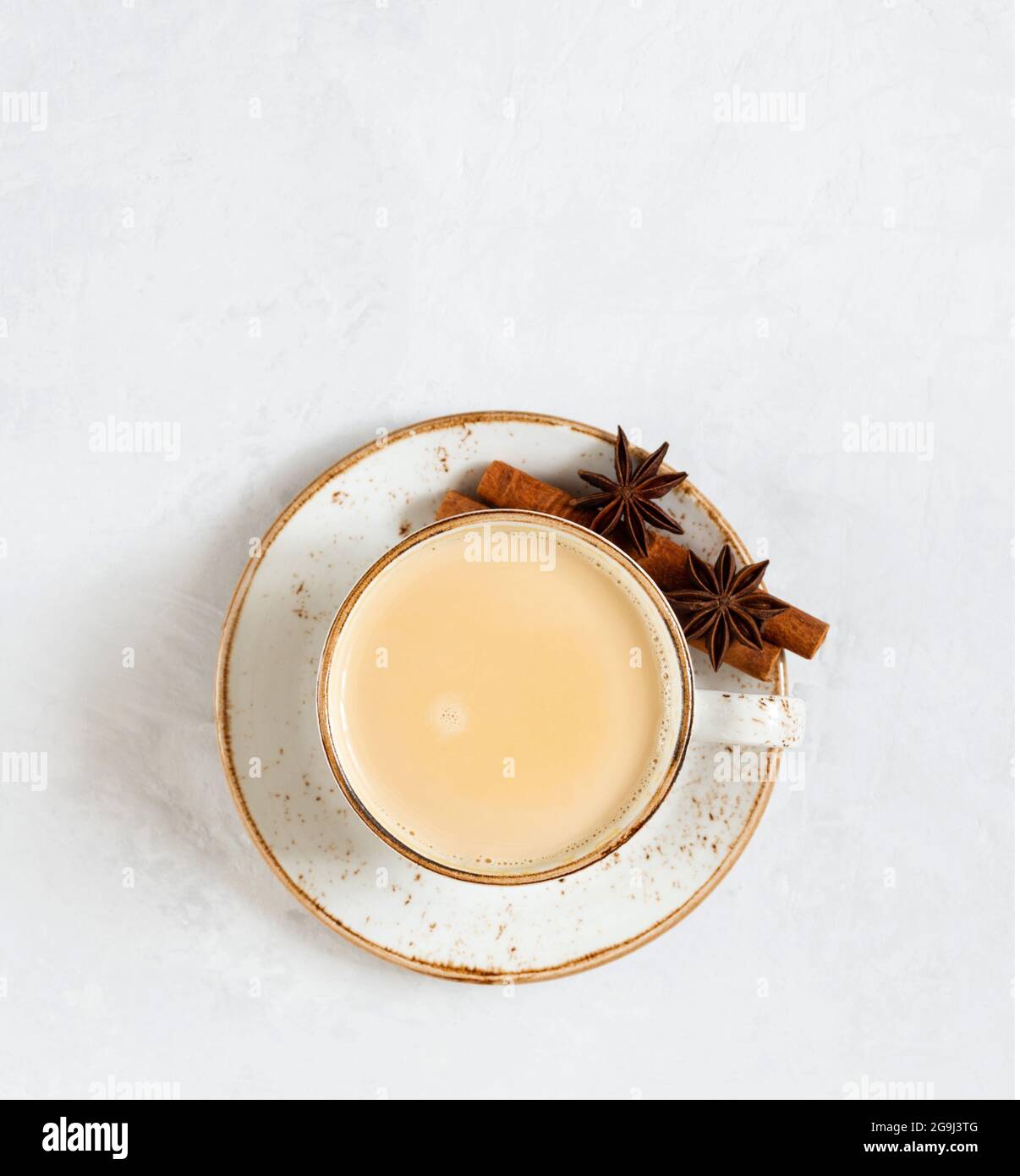 Masala chai tea on a white concrete background. Traditional Indian ...