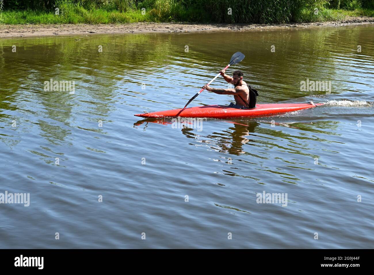 Chester, Cheshire, England - July 2021: Person paddling a kayak on the ...