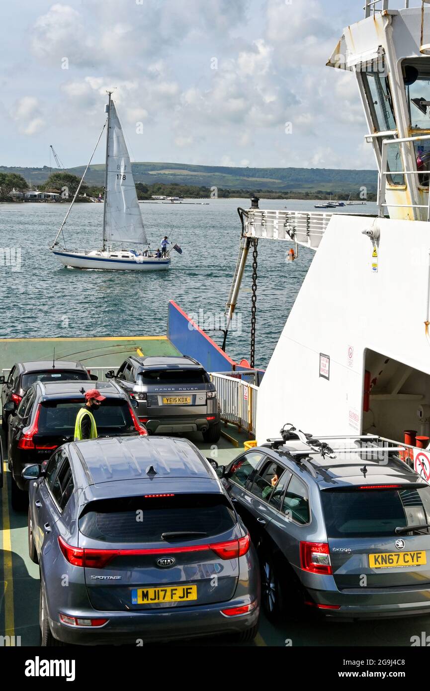 Poole, Dorset, England - June 2021: Cars on board the chain ferry which ...