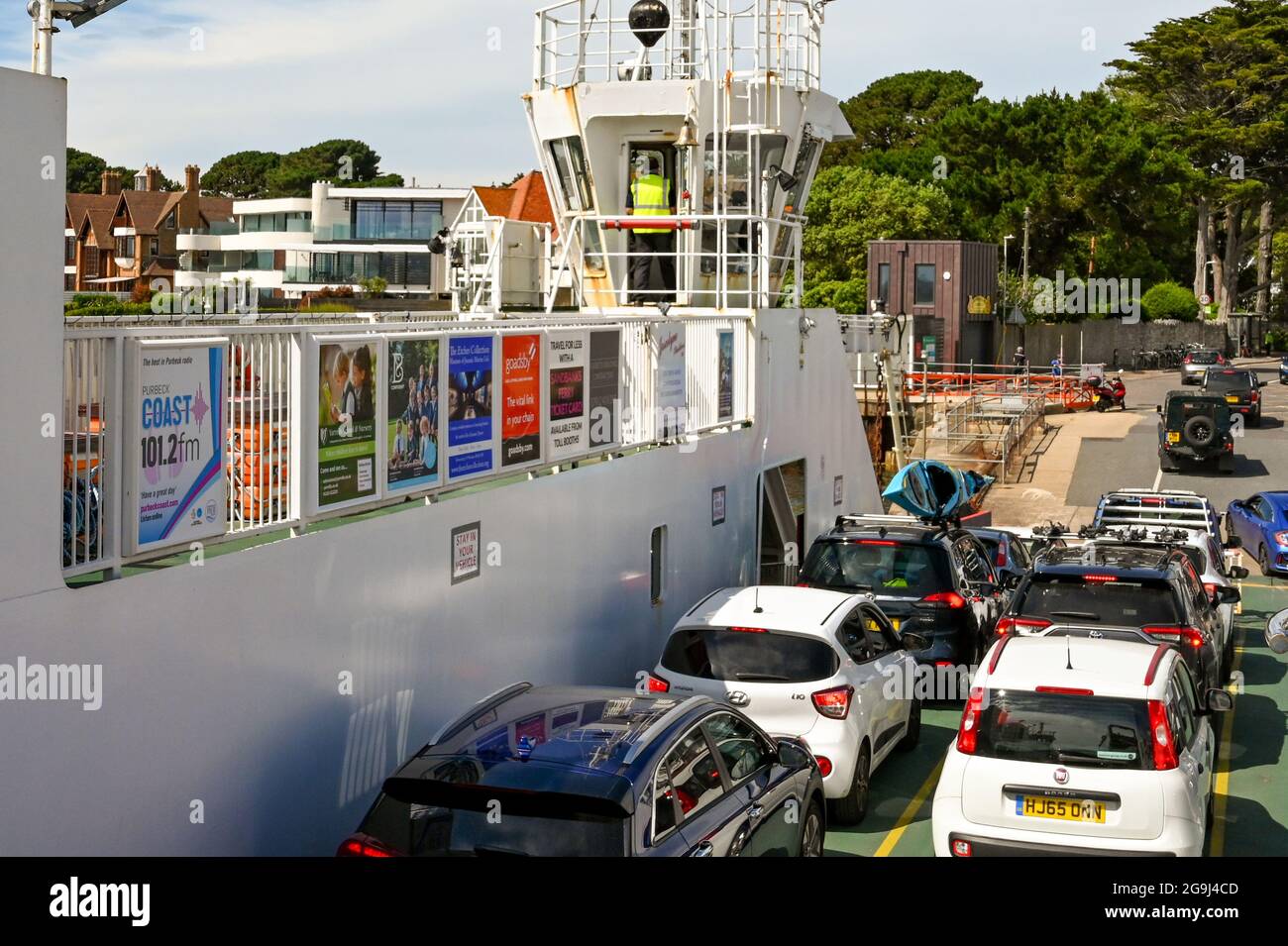 Poole, Dorset, England - June 2021: Cars waiting to drive off the chain ...