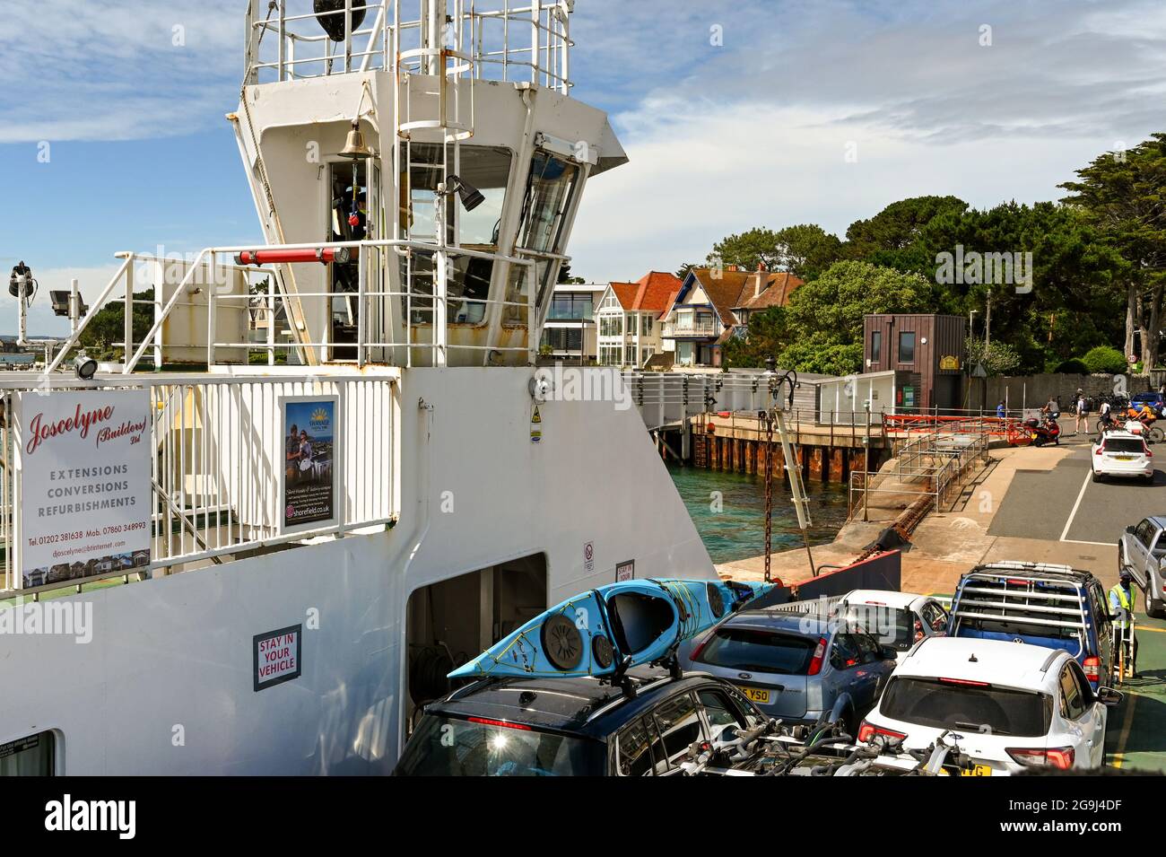 Poole, Dorset, England - June 2021: Cars waiting to drive off the chain ...