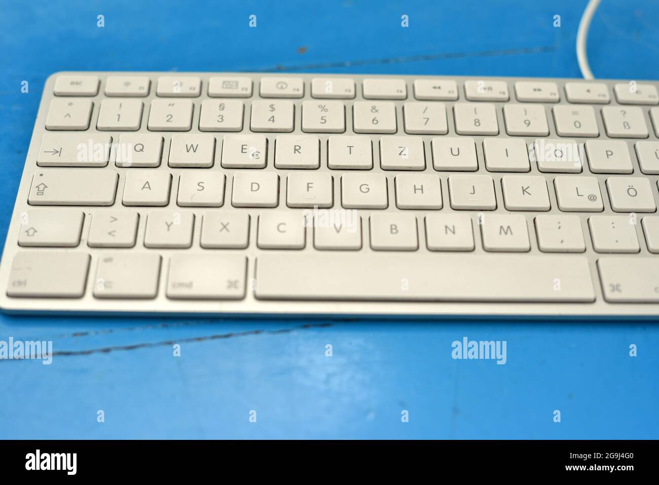 blue desk background and computer keyboard Stock Photo - Alamy
