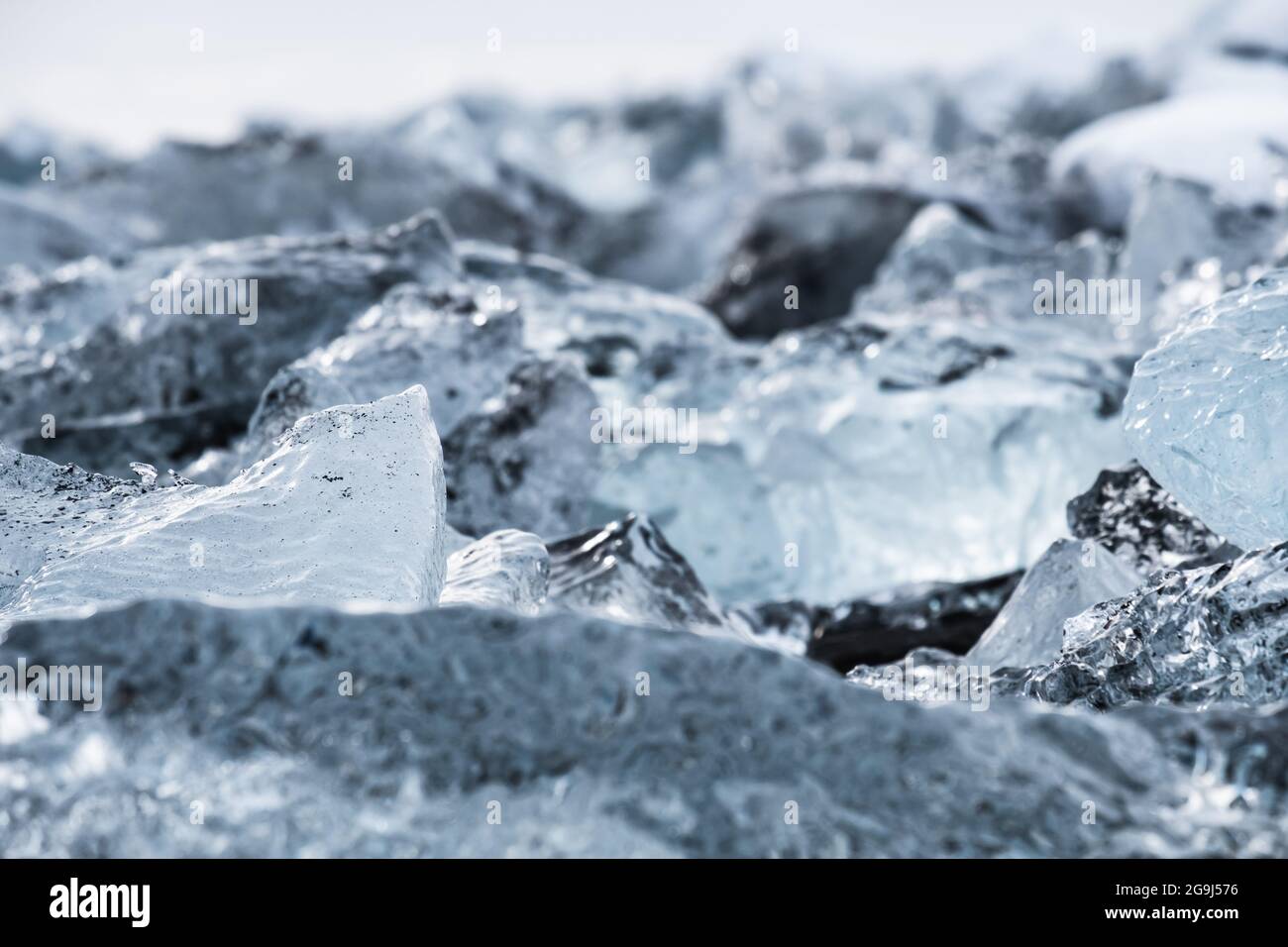 large blocks of clear blue ice with reflections Stock Photo - Alamy
