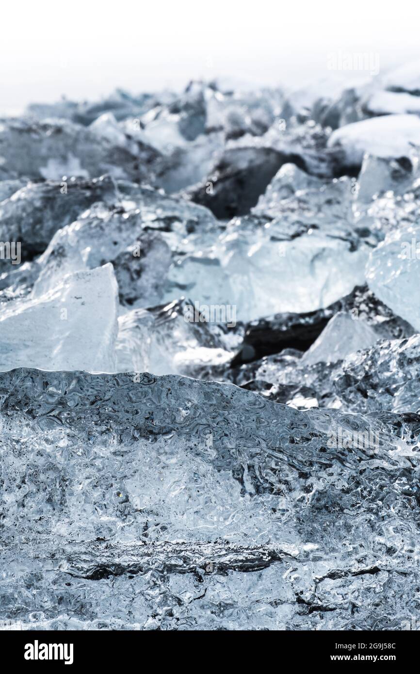 large blocks of clear blue ice with reflections Stock Photo - Alamy