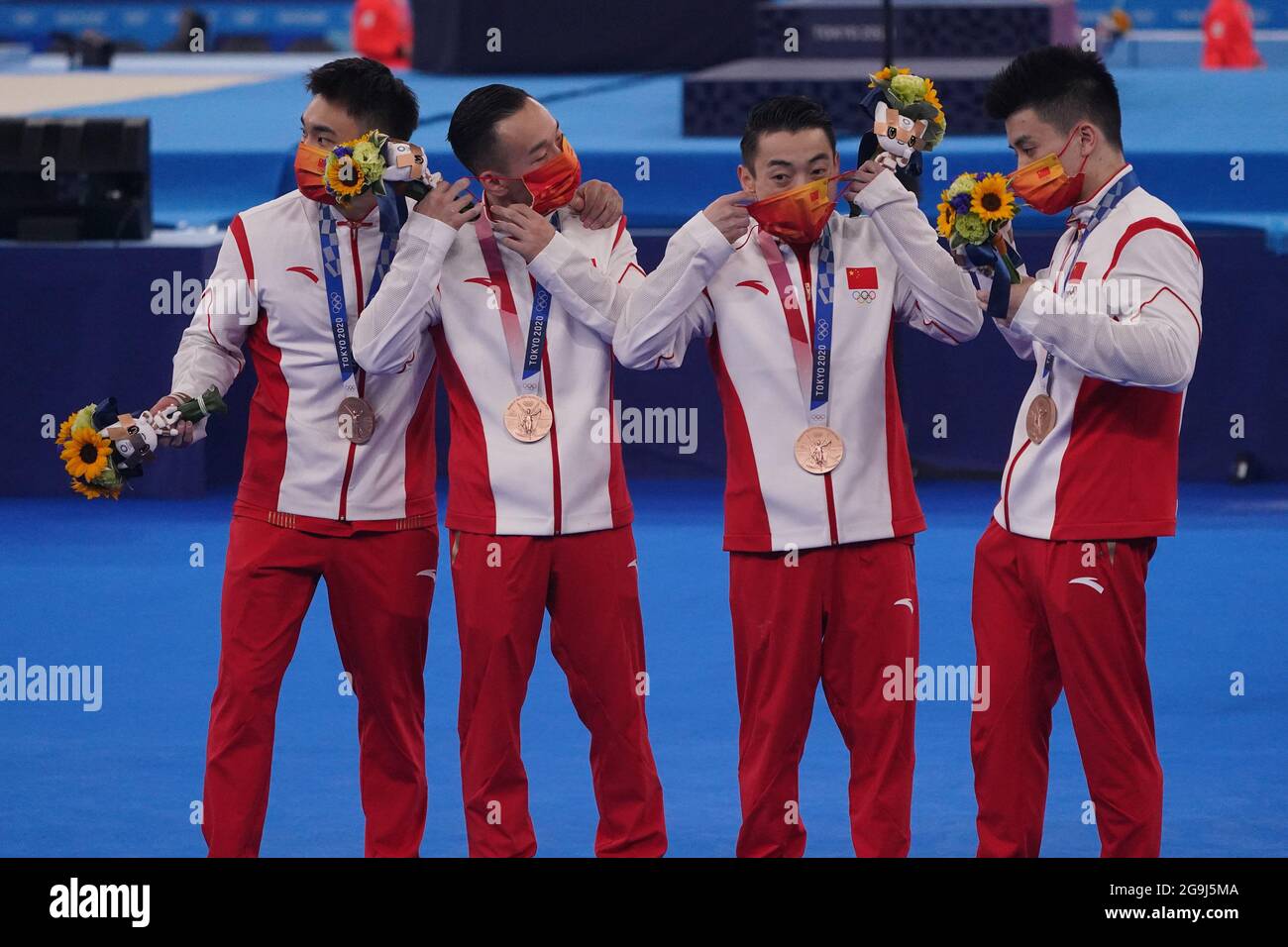 Tokyo, Japan. 26th July, 2021. Chinese gymnasts (L-R) Sun Wei, Zou ...