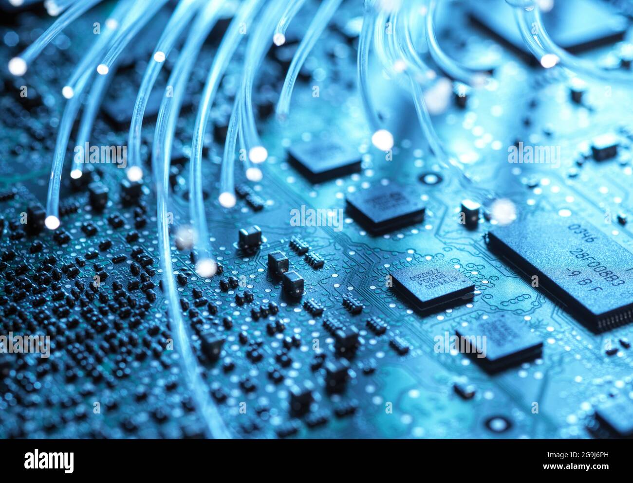 Close-up of fibre optics and computer circuit board Stock Photo - Alamy