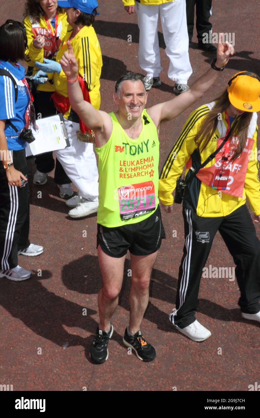 London, UK. Tony Audenshaw at the finish of the race during Virgin ...