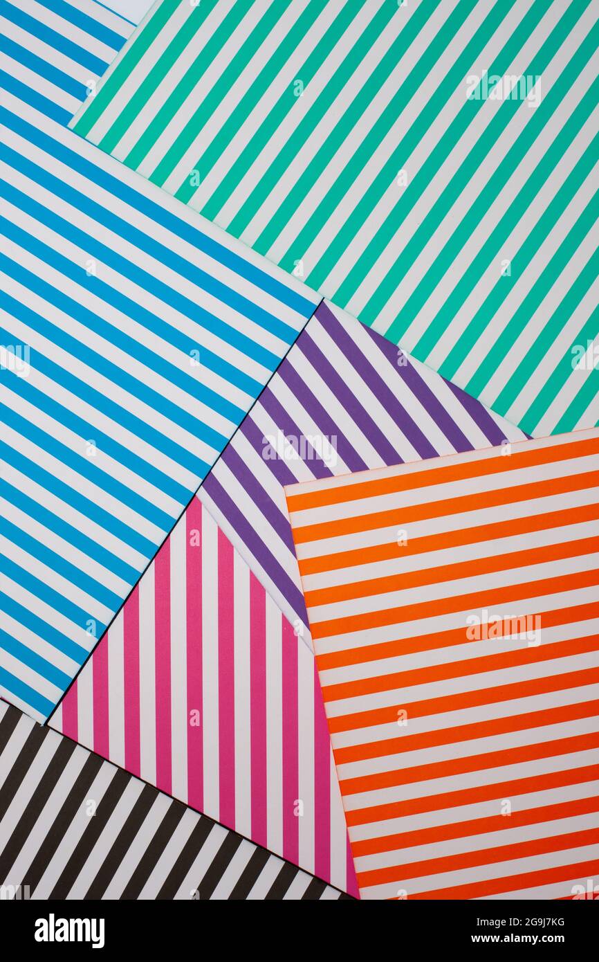 Geometric striped background. A modern, trendy multi-colored background ...