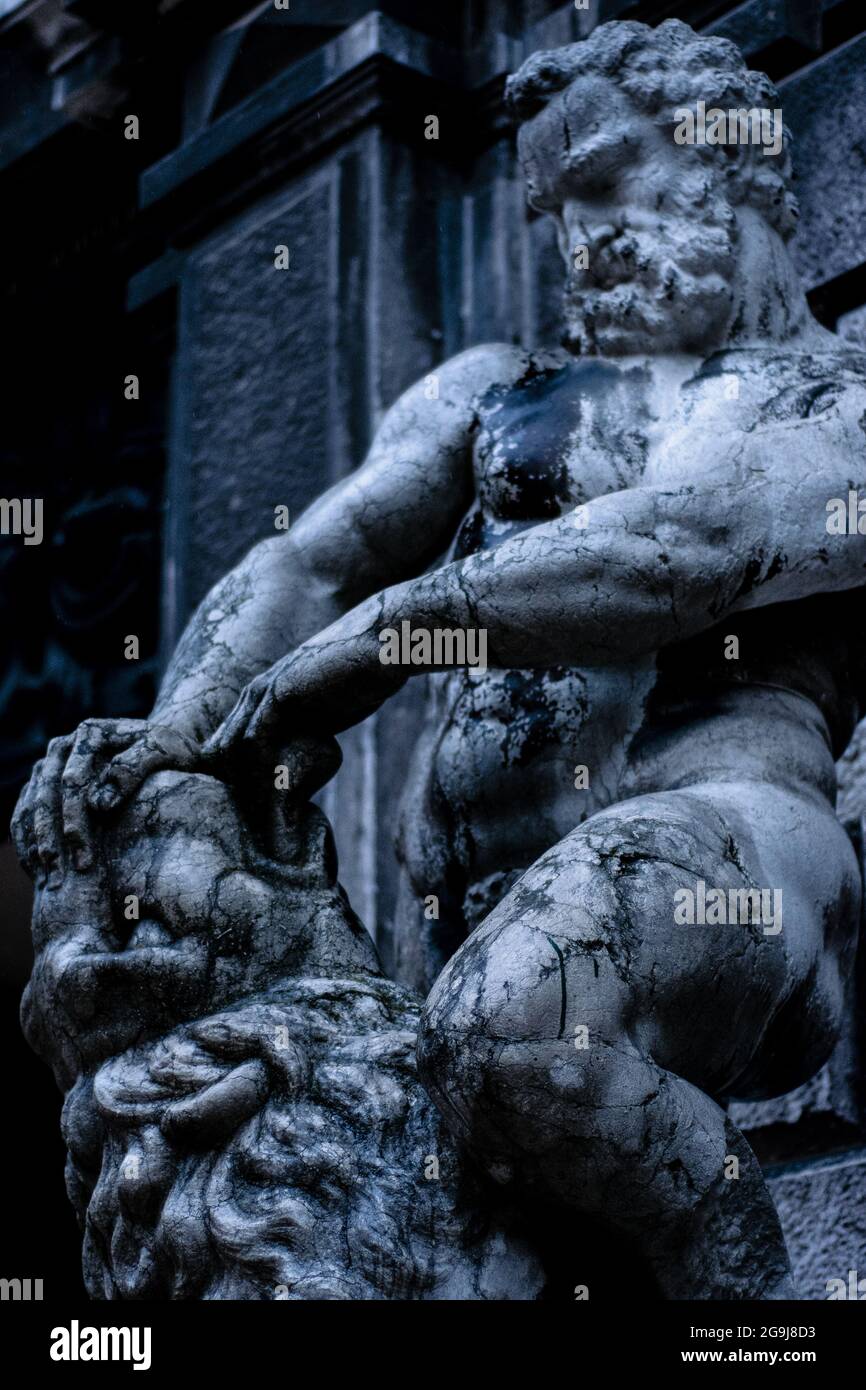 Vertical shot of a sculpture of Samson tearing apart a lion Stock Photo ...