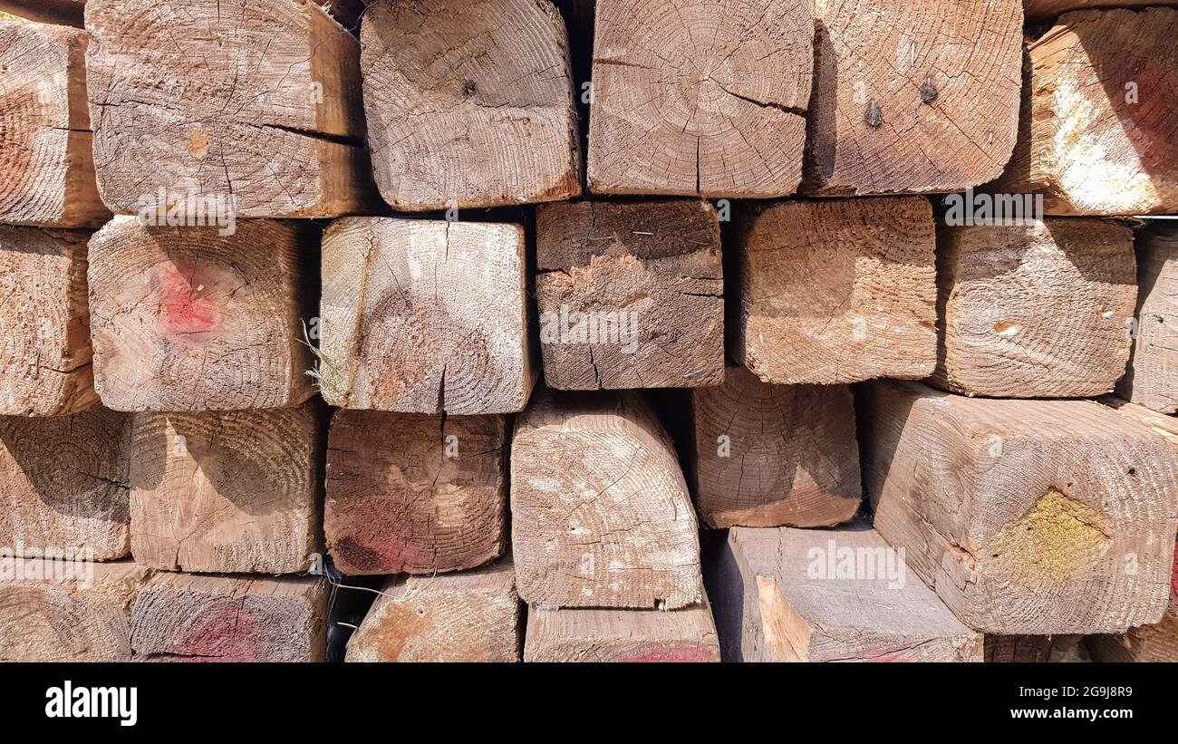 Stacked lumber. Folded wood.Closeup wooden boards.The surface of the ...