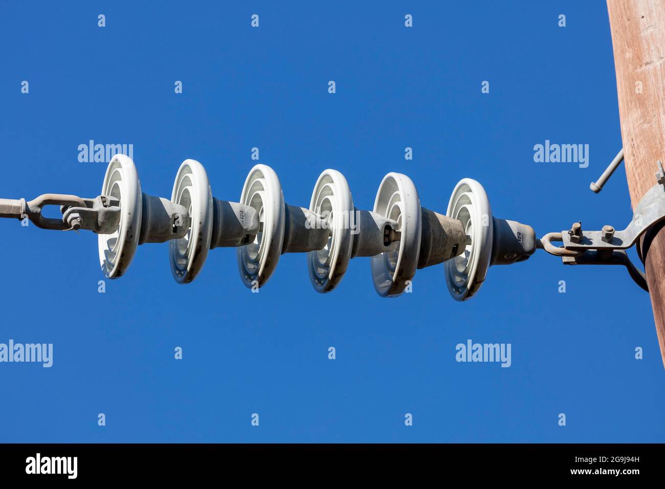 Photograph of a transmission line cable system connected to an assembly ...