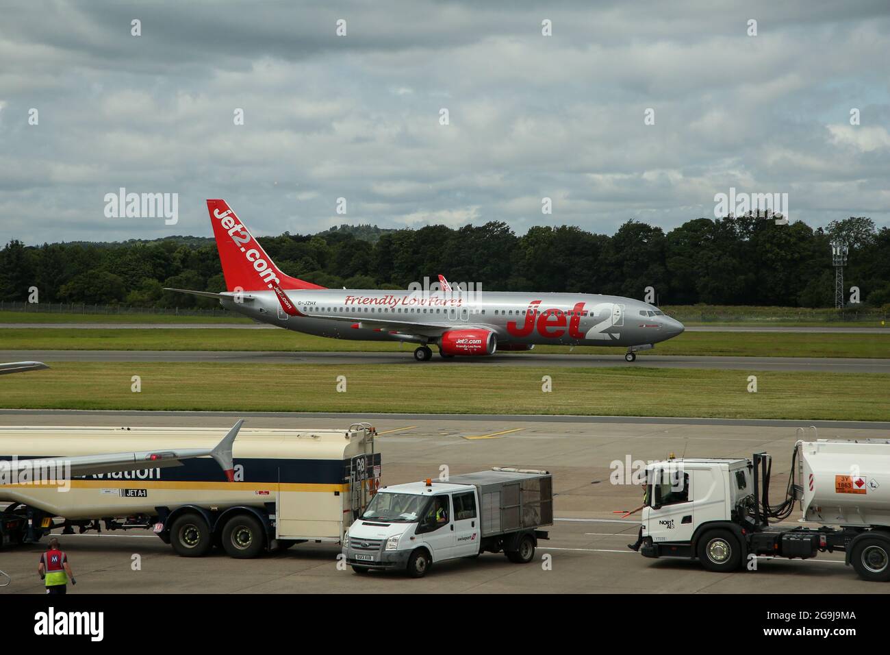 Jet2 aircraft and aviation fuel tankers at Edinburgh Airport Stock ...