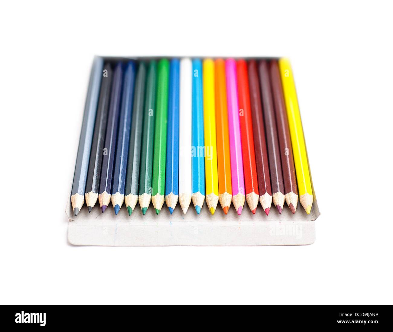 A stack of colored pencils on white background Stock Photo - Alamy