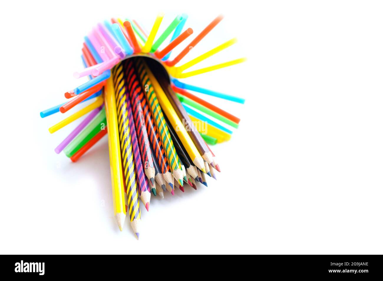 A stack of colored pencils on white background Stock Photo - Alamy