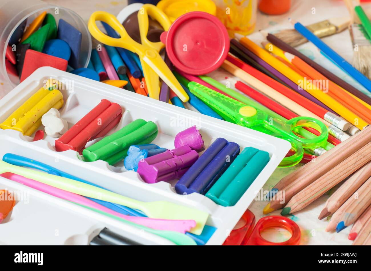 Creative Art Background made of paint brushes, plasticine, colored ...