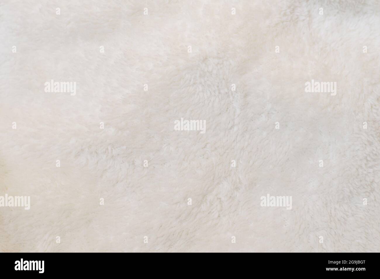 Blurred background of soft tissue. Beige background of plush fabric ...