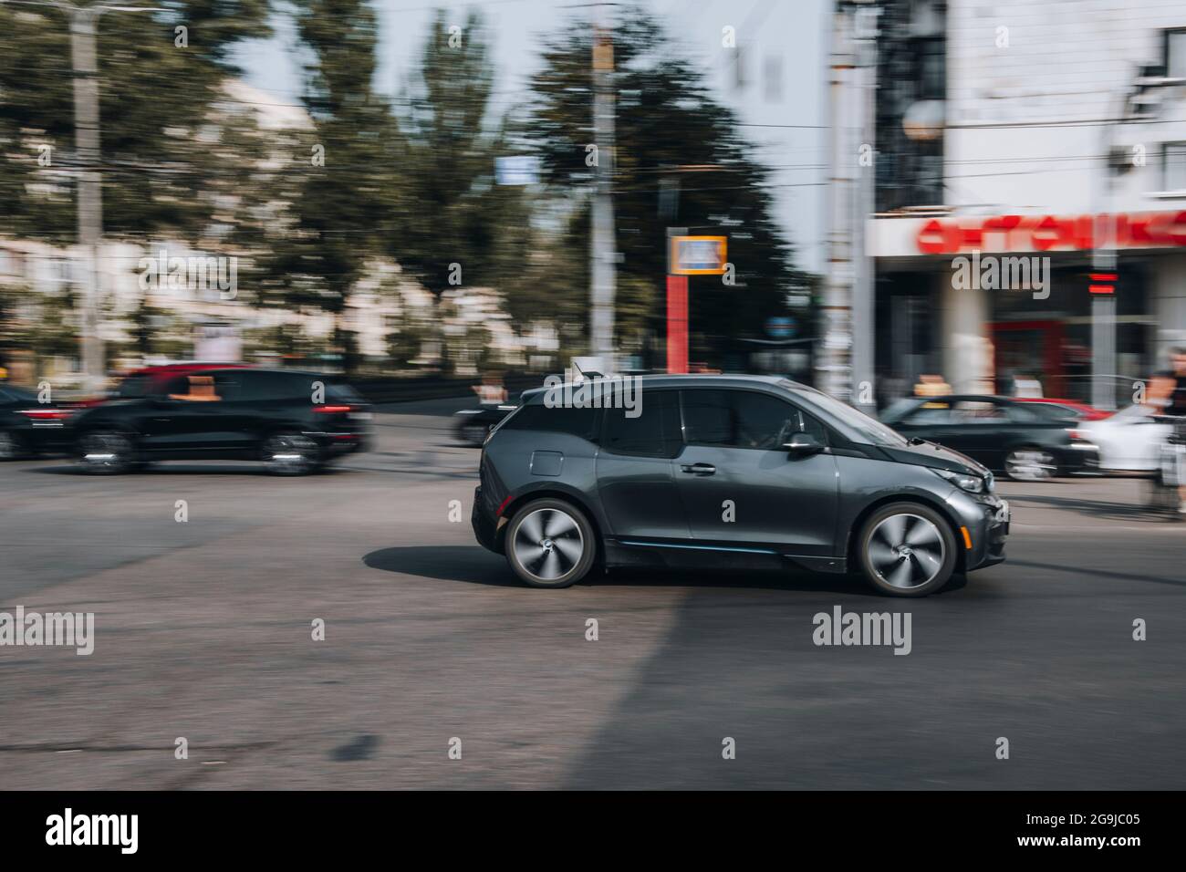 Ukraine, Kyiv - 16 July 2021: Gray BMW i3 car moving on the street ...