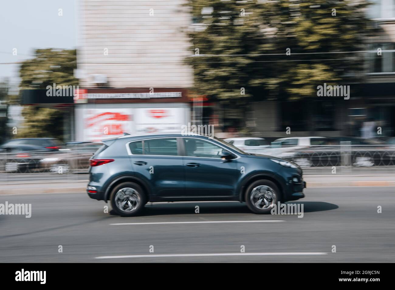 Ukraine, Kyiv - 16 July 2021: Light Blue KIA Sportage car moving on the ...