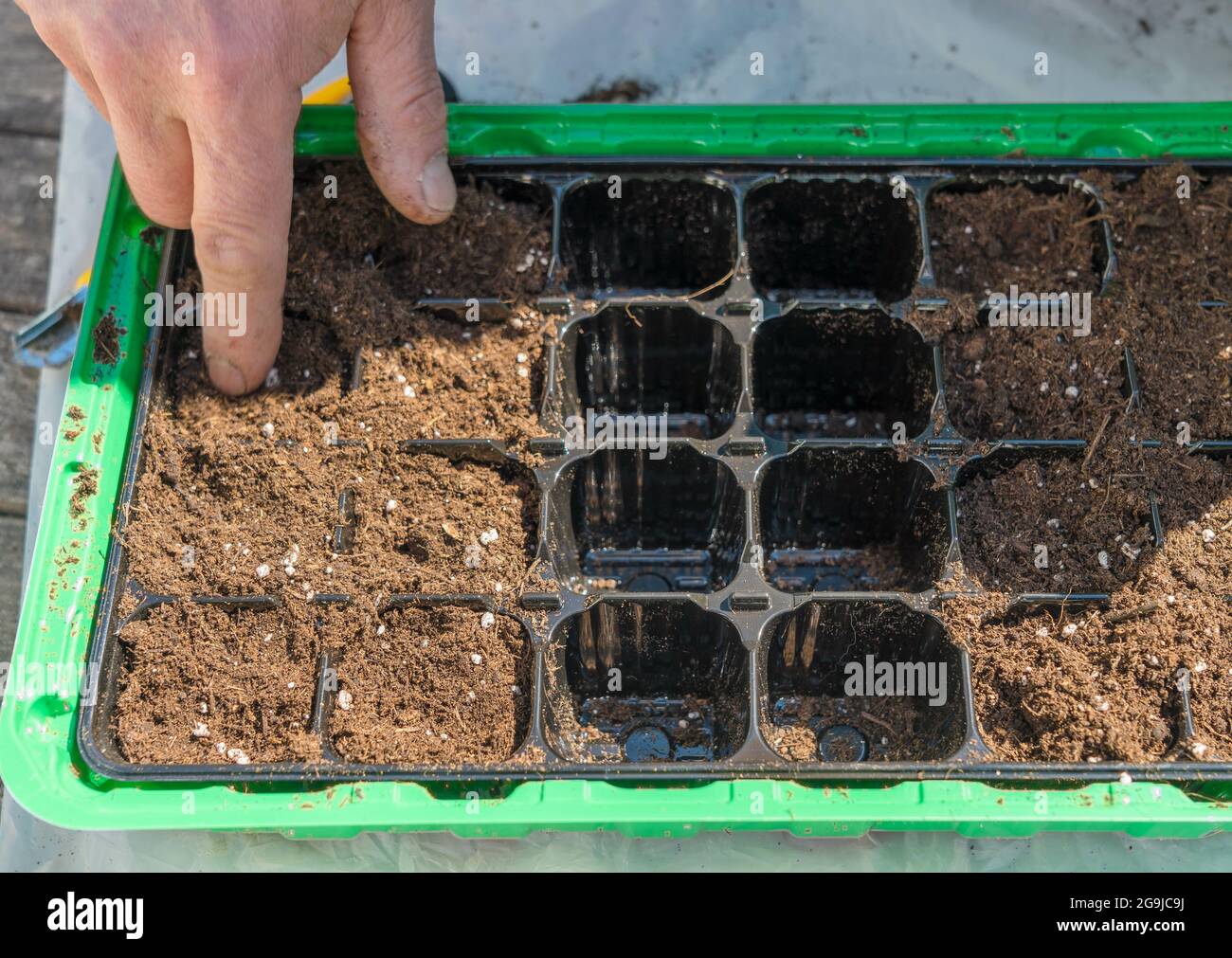 High angle shot of a male planting soil for agricultural purposes Stock ...