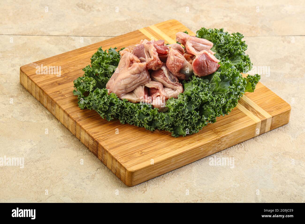 Raw tasty chicken stomach for cooking Stock Photo - Alamy
