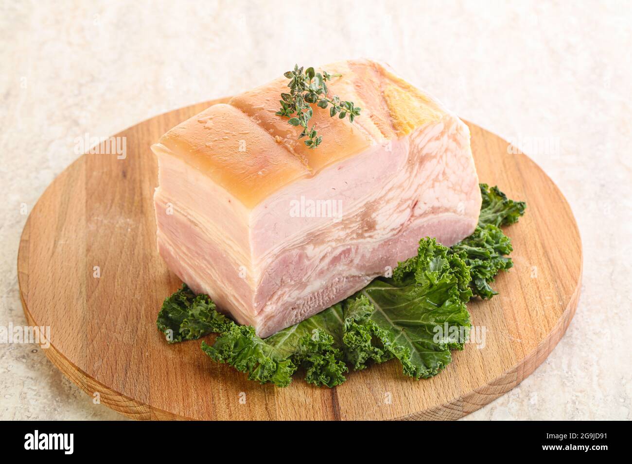 Cut of homemade pork bacon over board Stock Photo - Alamy