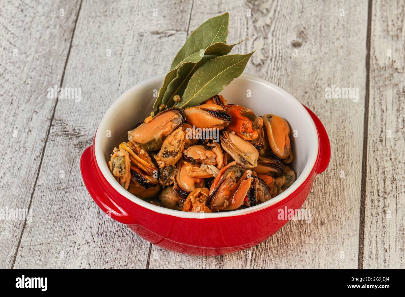 Pickled mussels with spices in the bowl Stock Photo - Alamy