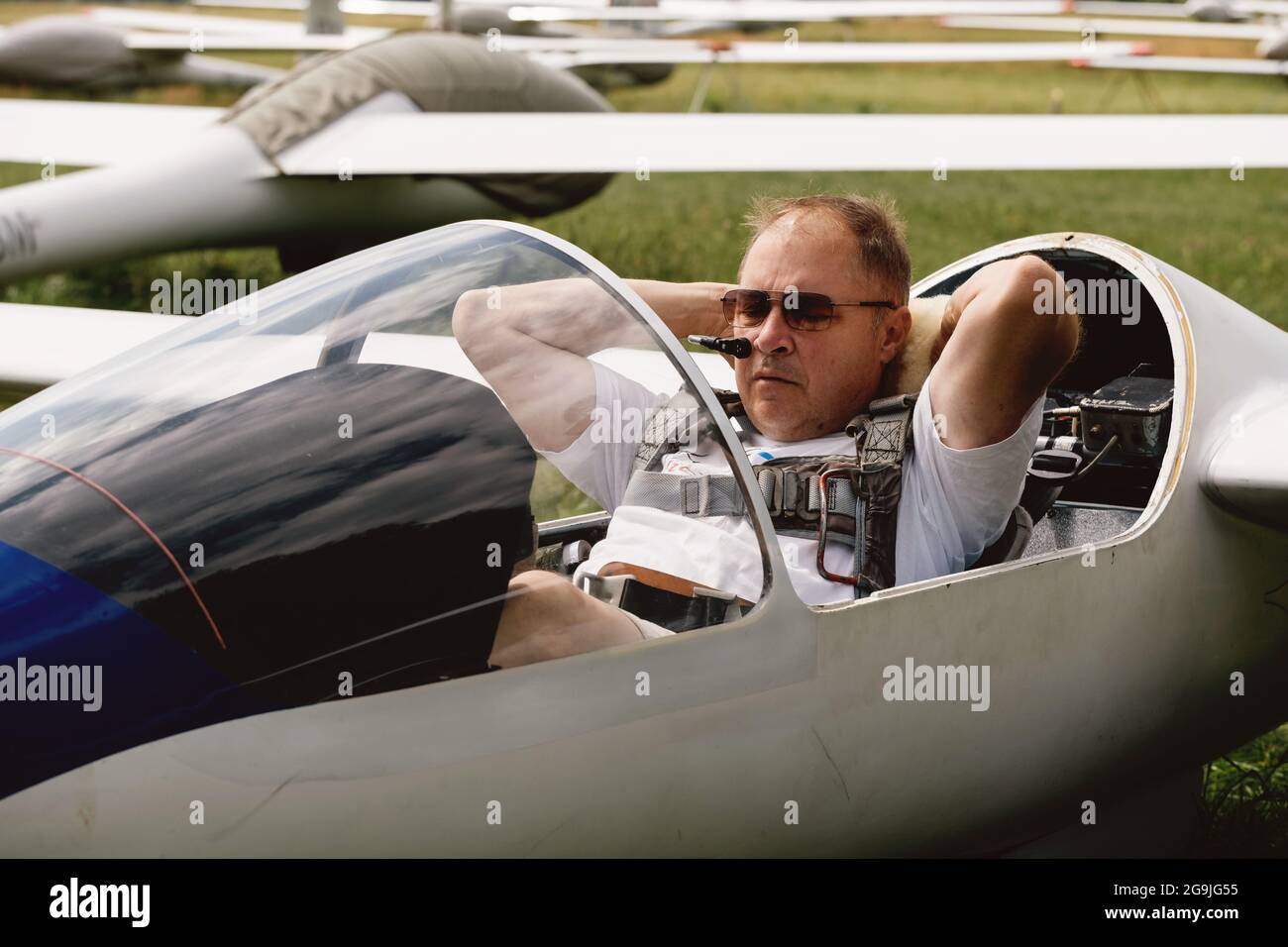 Glider pilot getting ready for flight on fixed-wing aircraft from ...