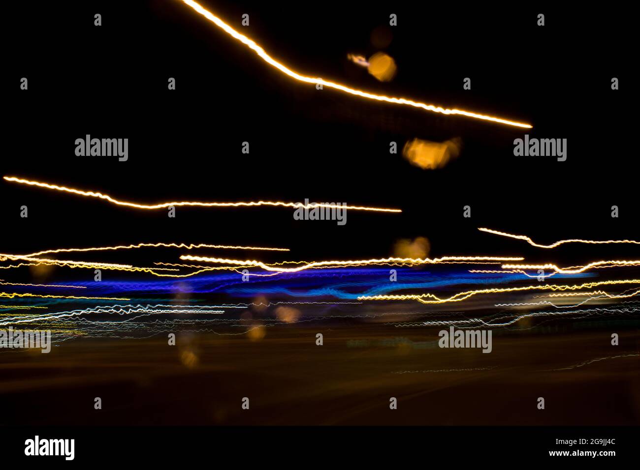 Driving Around Town. Light Rain. Long Exposure. A view through the ...