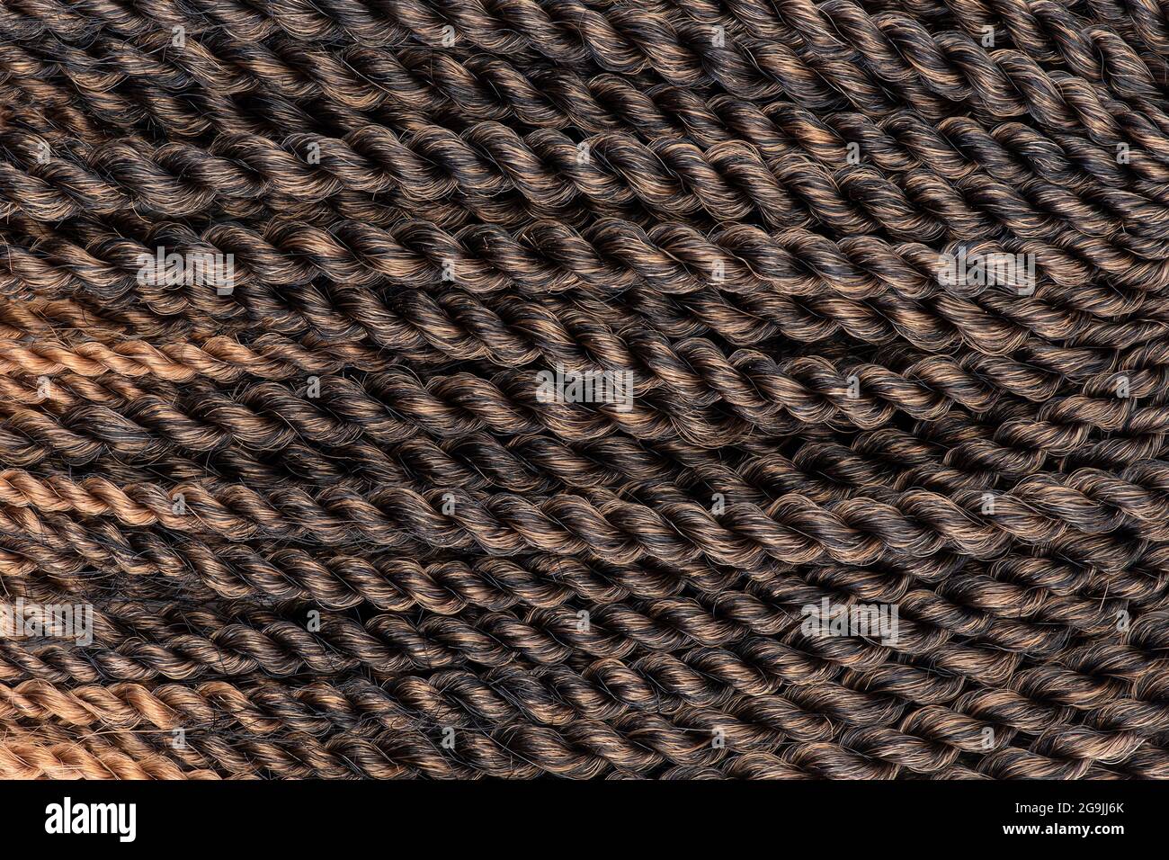 Texture of brown hair extension braids Stock Photo - Alamy