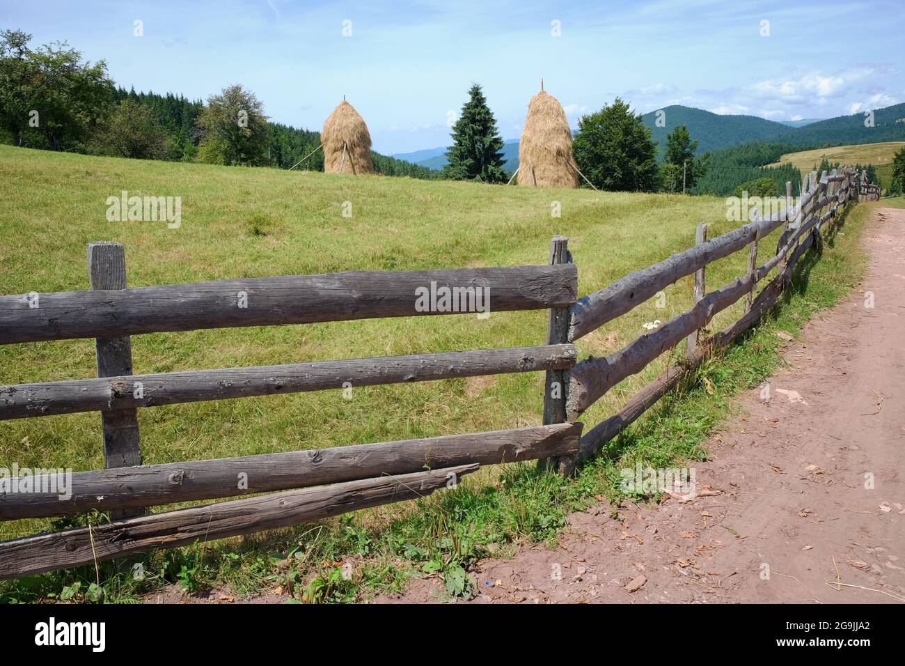 fence and haystack in Apuseni Mountain, Romania Stock Photo - Alamy