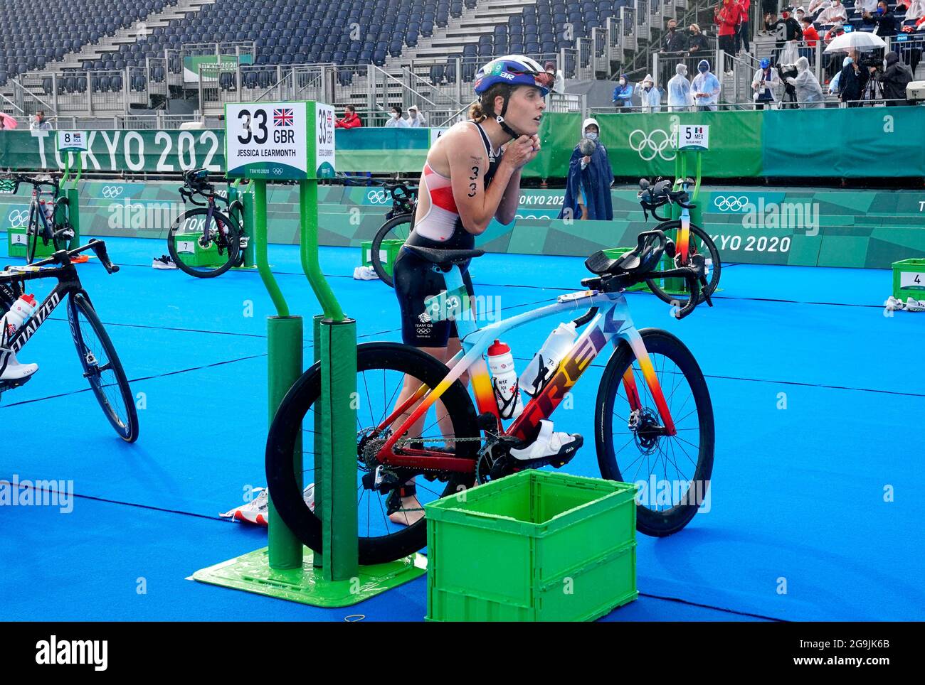 Great Britain's Jessica Learmonth fastens her helmet before getting on ...