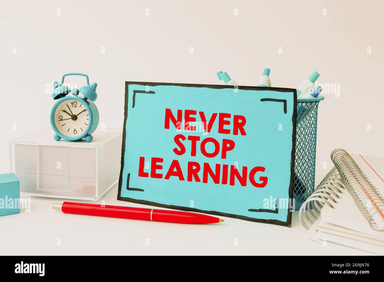 Hand writing sign Never Stop Learning. Internet Concept continuous ...