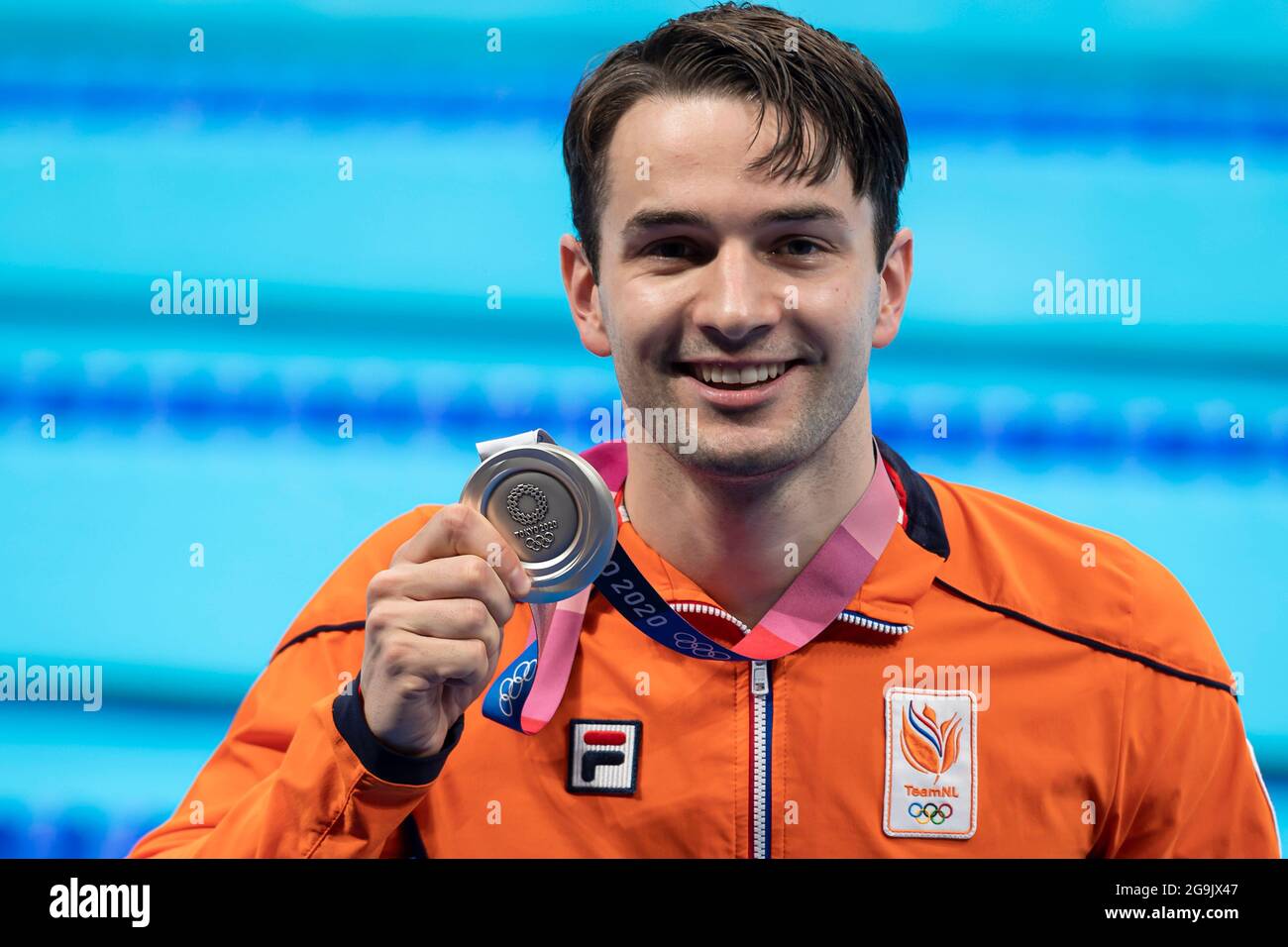 TOKYO, JAPAN - JULY 26: Arno Kamminga of Netherlands shows his silver ...