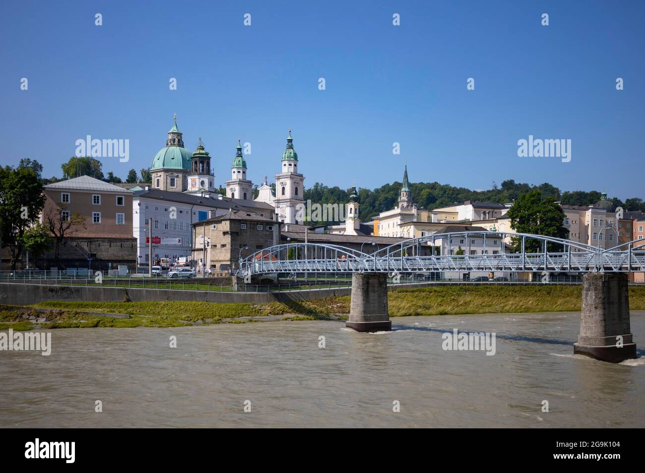 Mozartsteg over the Salzach river with a view of Salzburg's old town ...