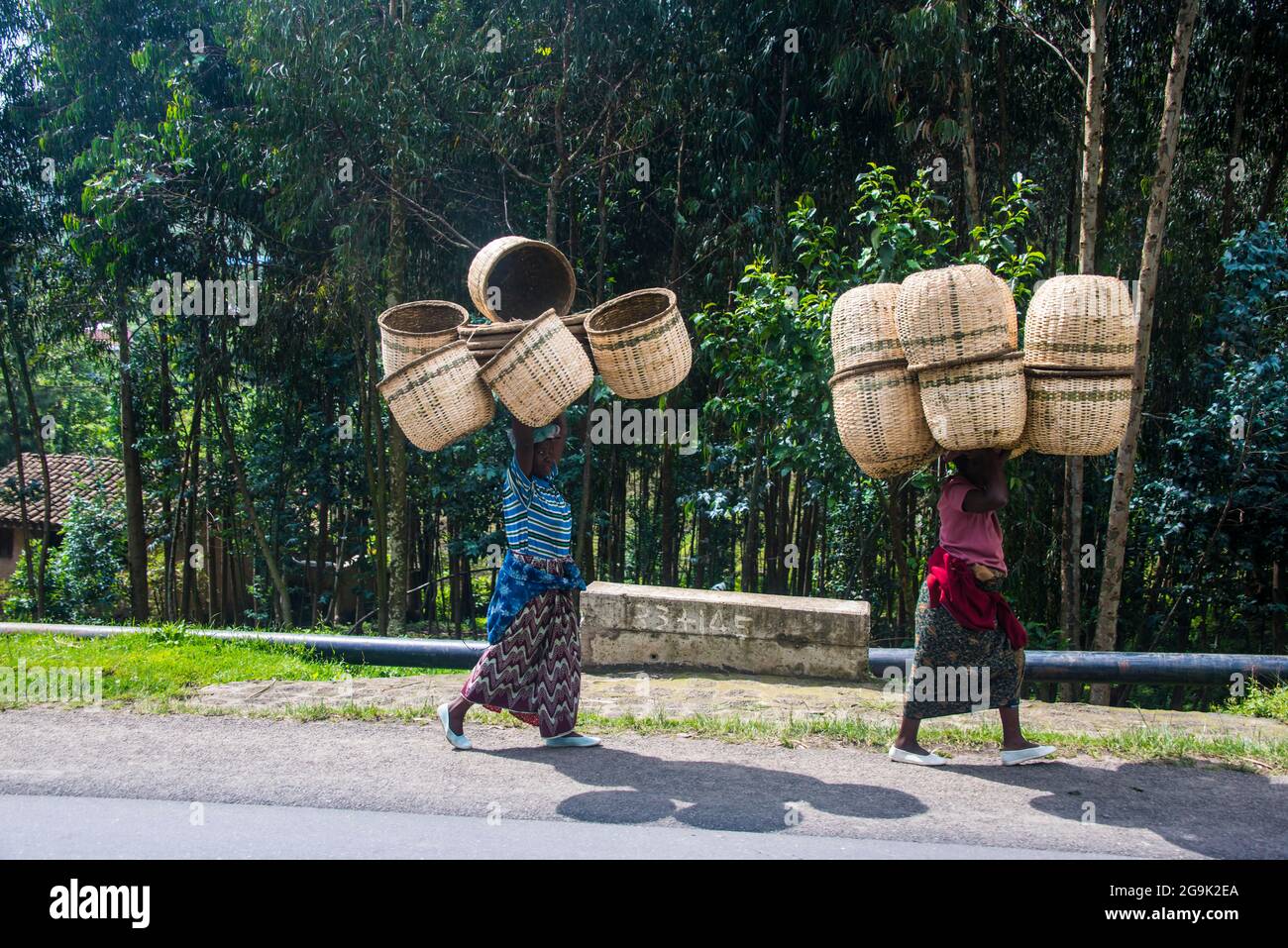 Woman carrying giant baskets, Rwanda, Africa Stock Photo - Alamy
